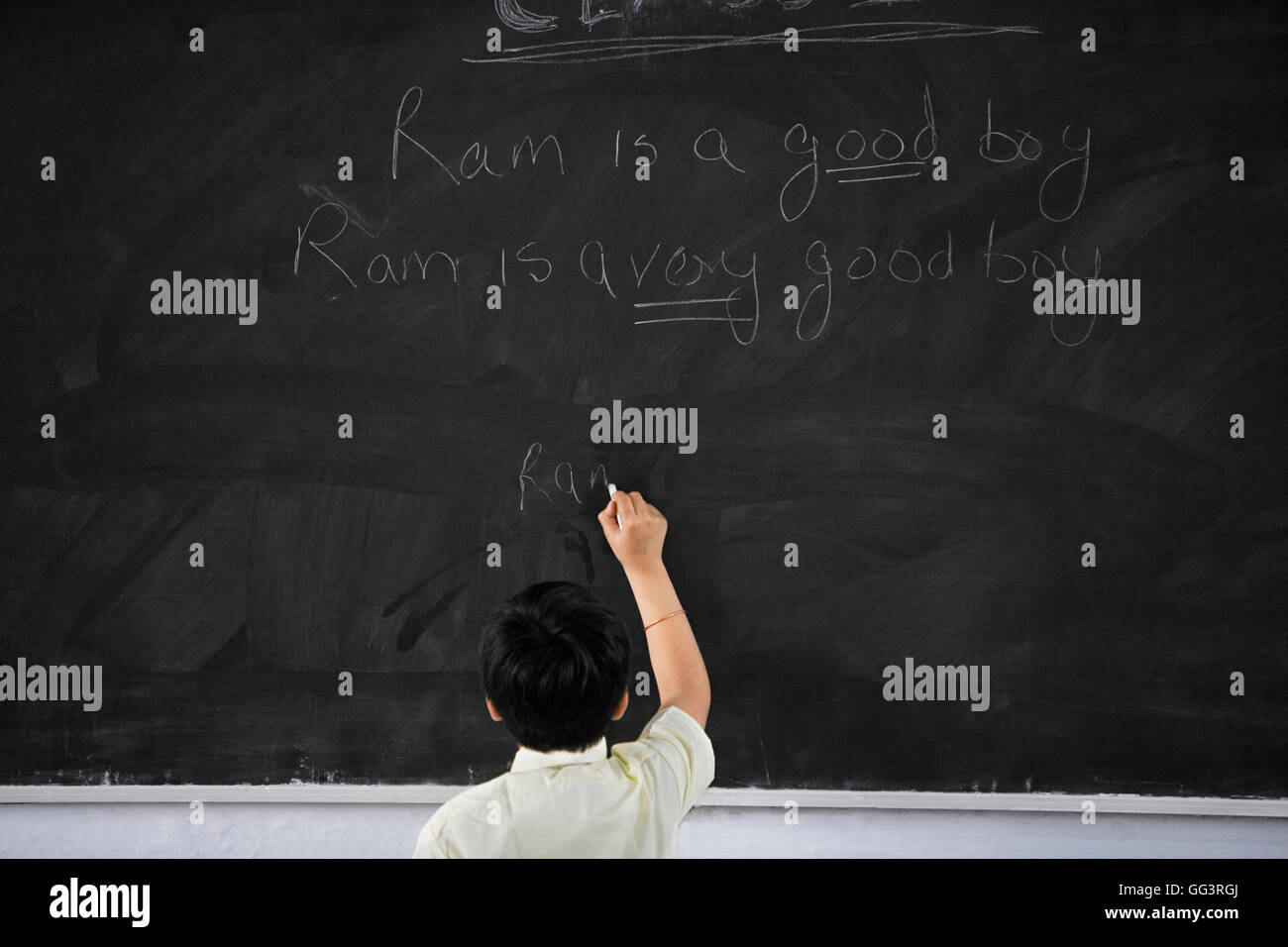 Indian boys school writing hi-res stock photography and images - Alamy
