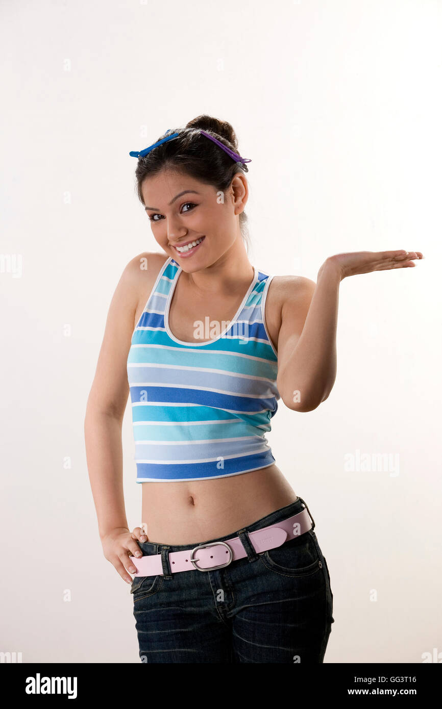 Woman posing and smiling Stock Photo - Alamy