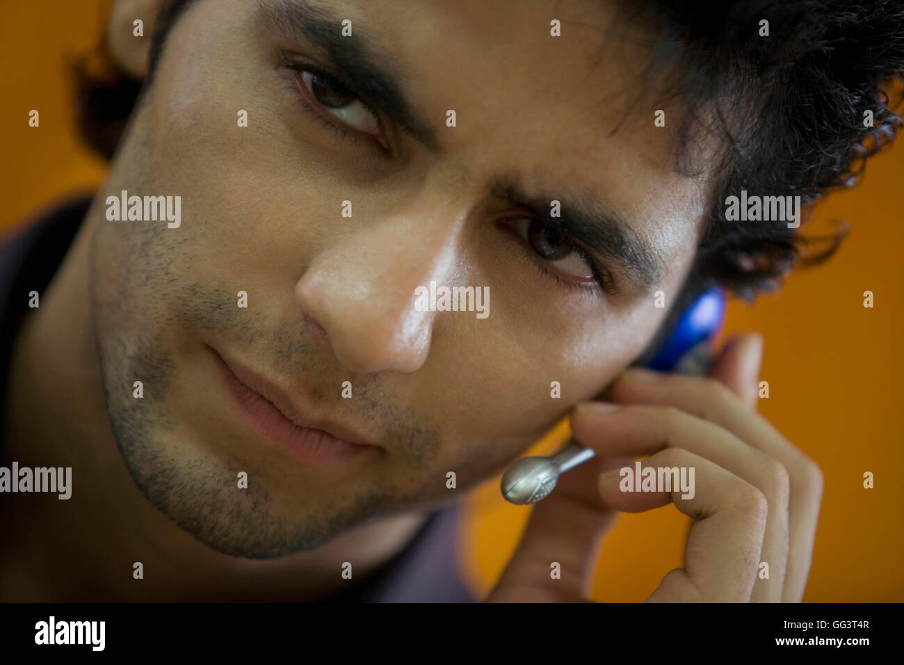 Person speaking into microphone hi-res stock photography and images - Alamy