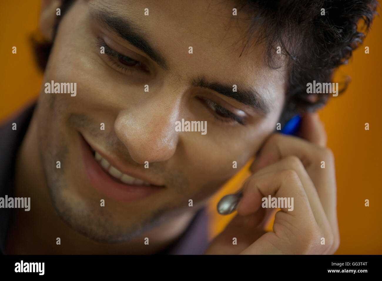 Executive talking on microphone Stock Photo - Alamy