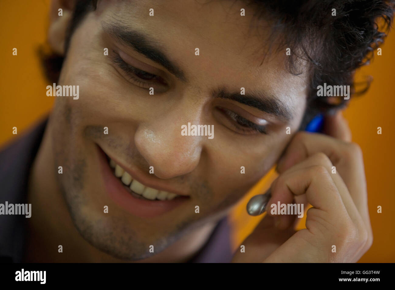 Executive talking on microphone Stock Photo - Alamy