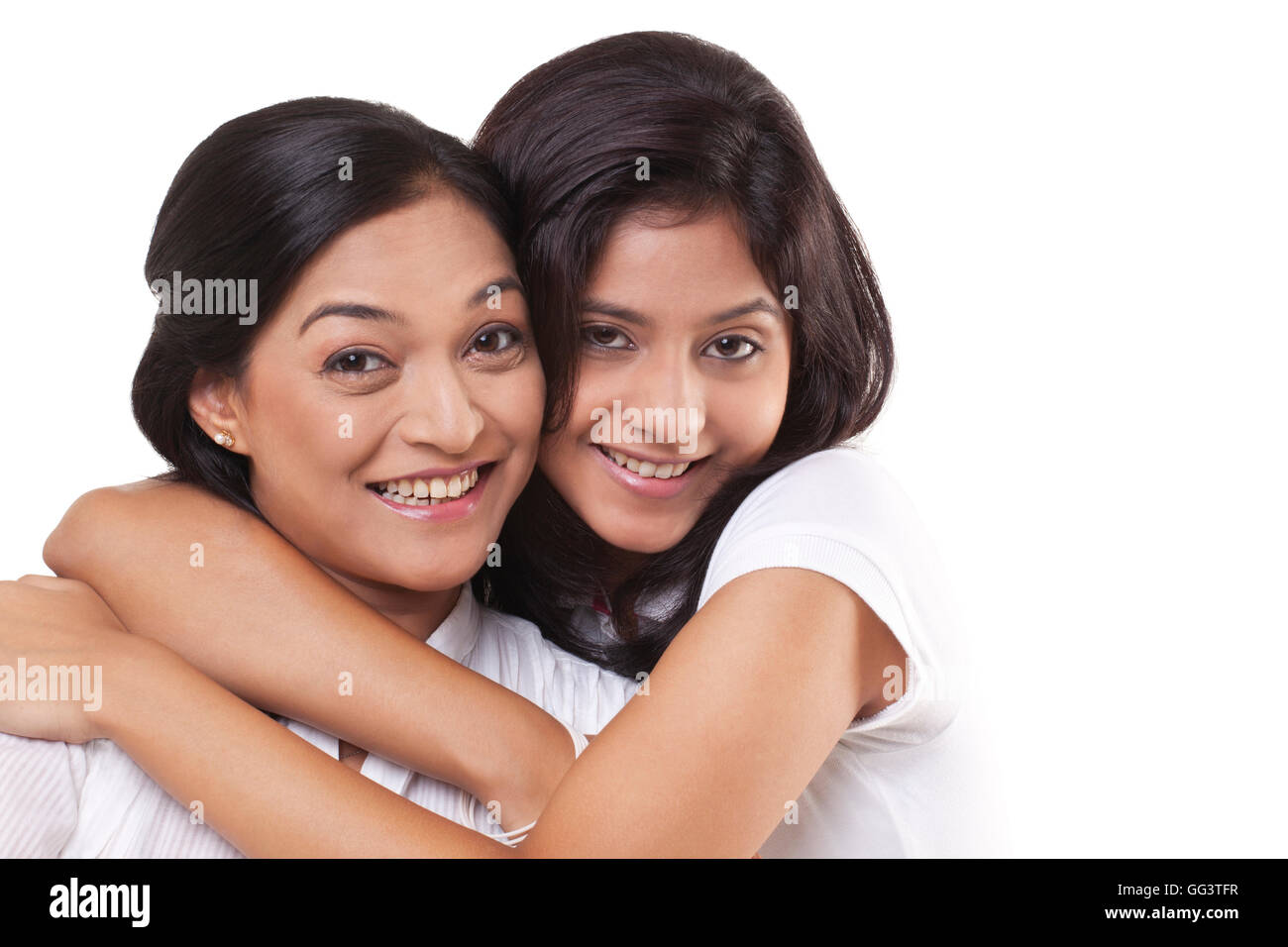 Portrait of happy mother and daughter embracing Stock Photo - Alamy