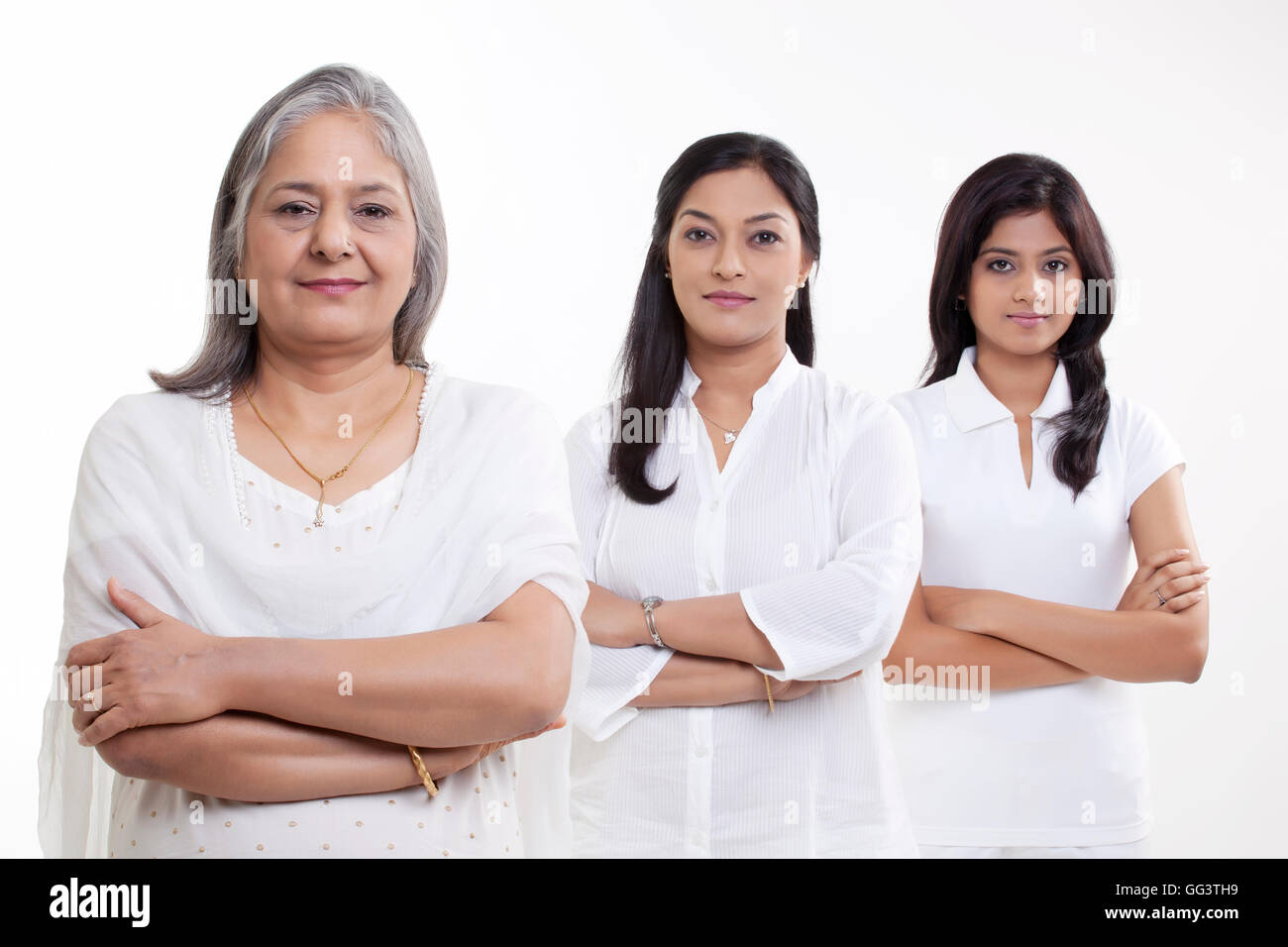 Portrait of multi generation family smiling over white background Stock ...