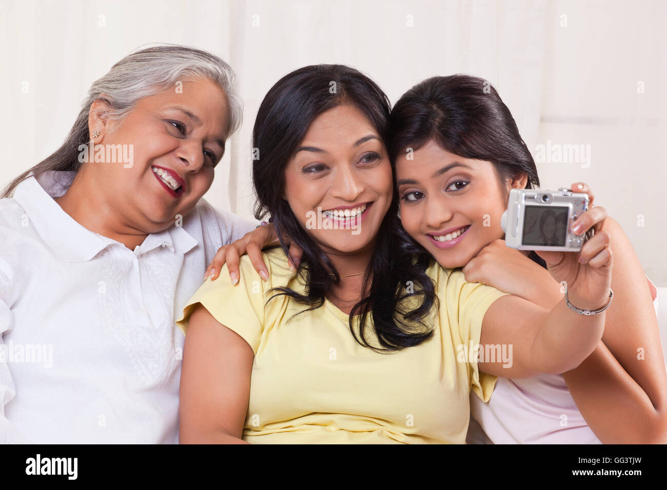 Family taking self-portrait with digital camera Stock Photo - Alamy