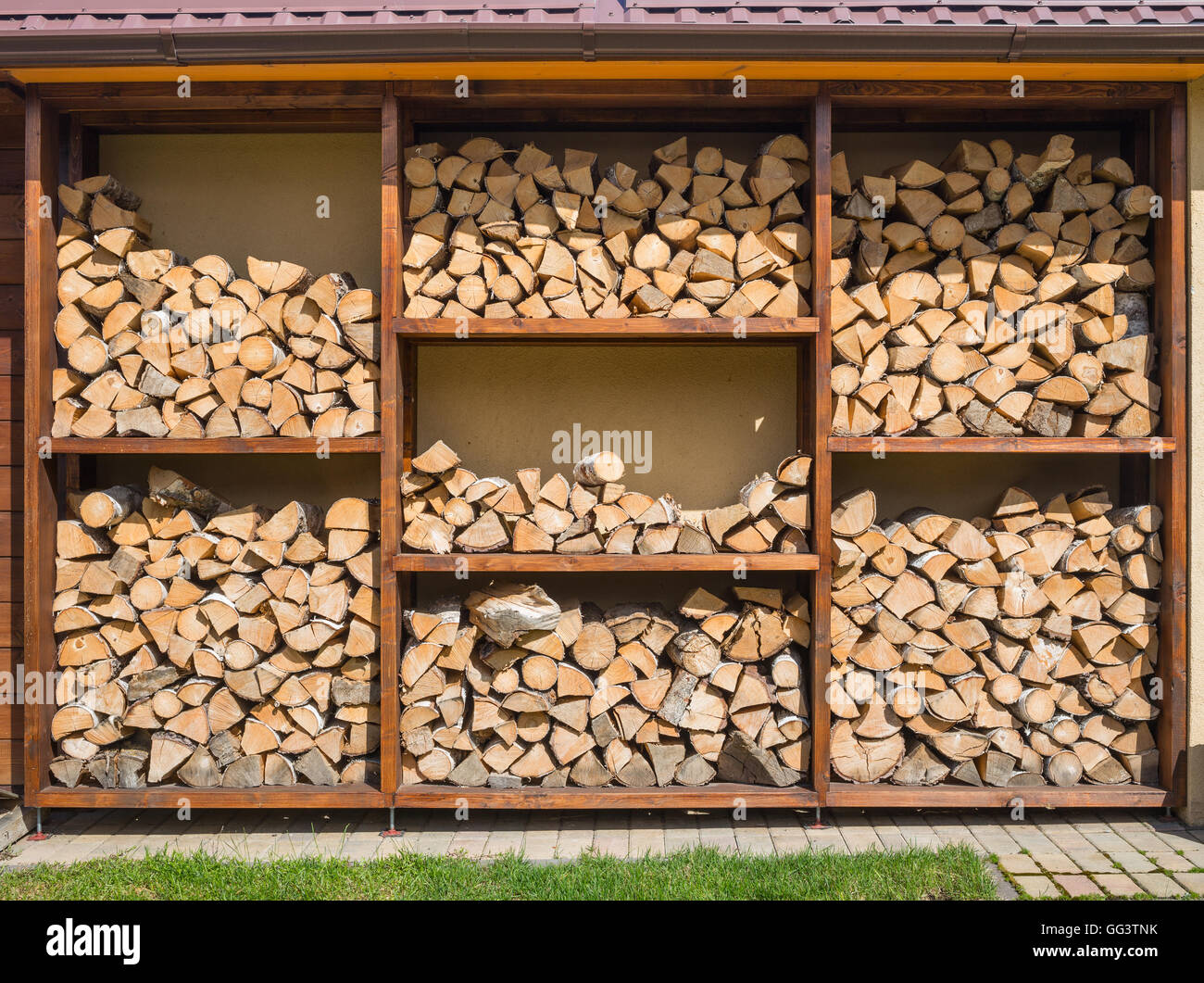Stack of firewood ready for the fireplace divided in square boxes Stock ...