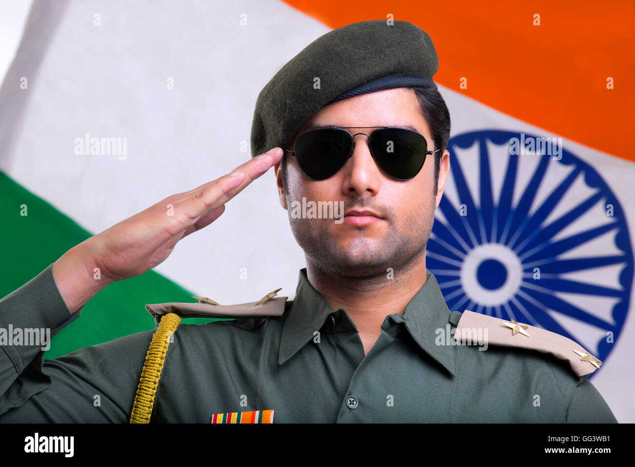 Young security guard saluting indian hi-res stock photography and ...