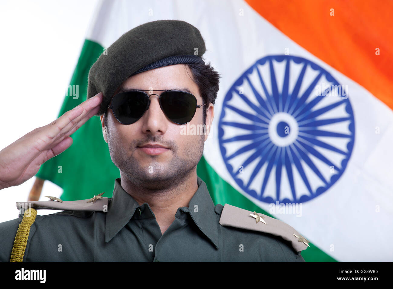 Young security guard saluting indian hi-res stock photography and ...