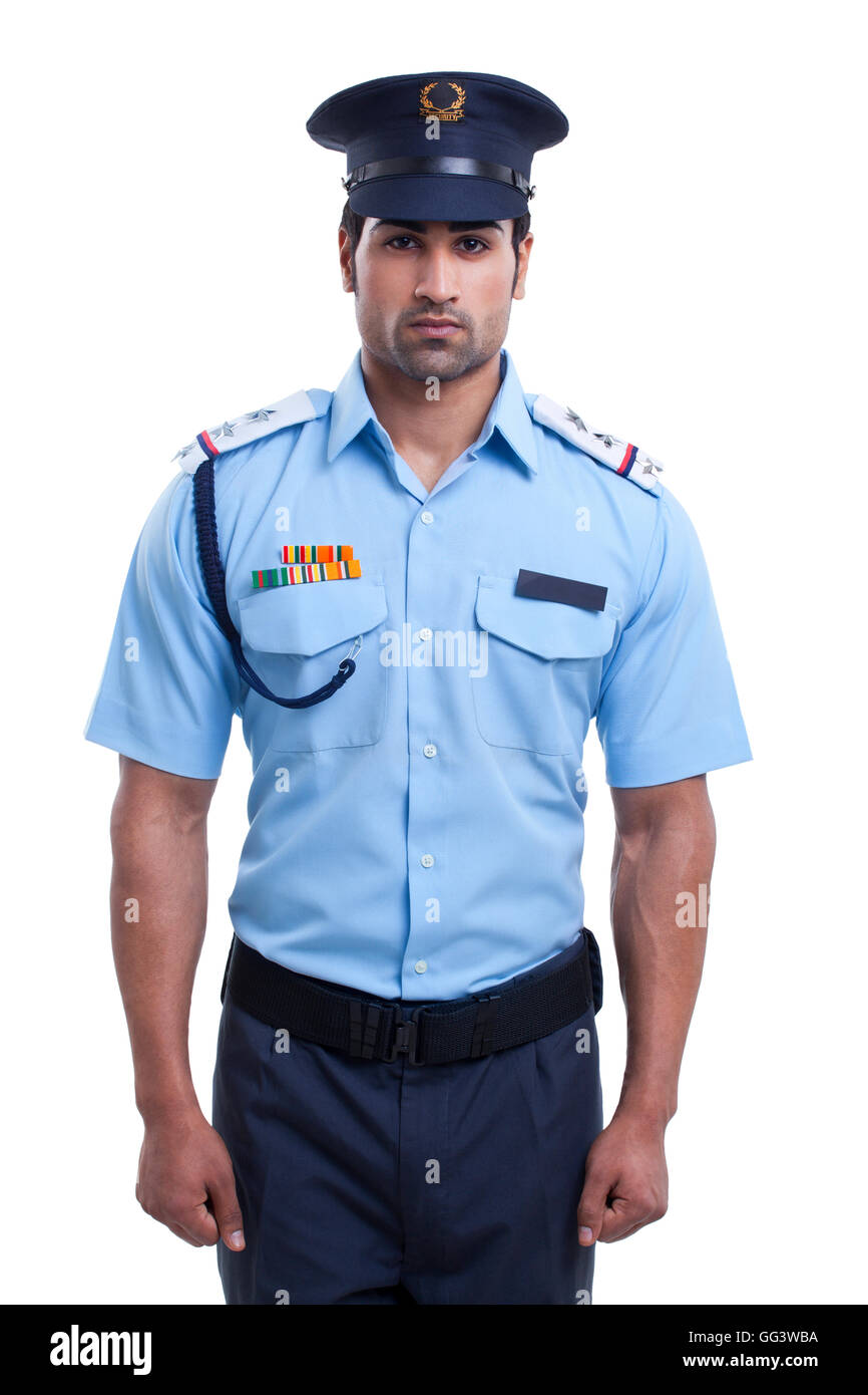 Male security guard standing over white background Stock Photo - Alamy