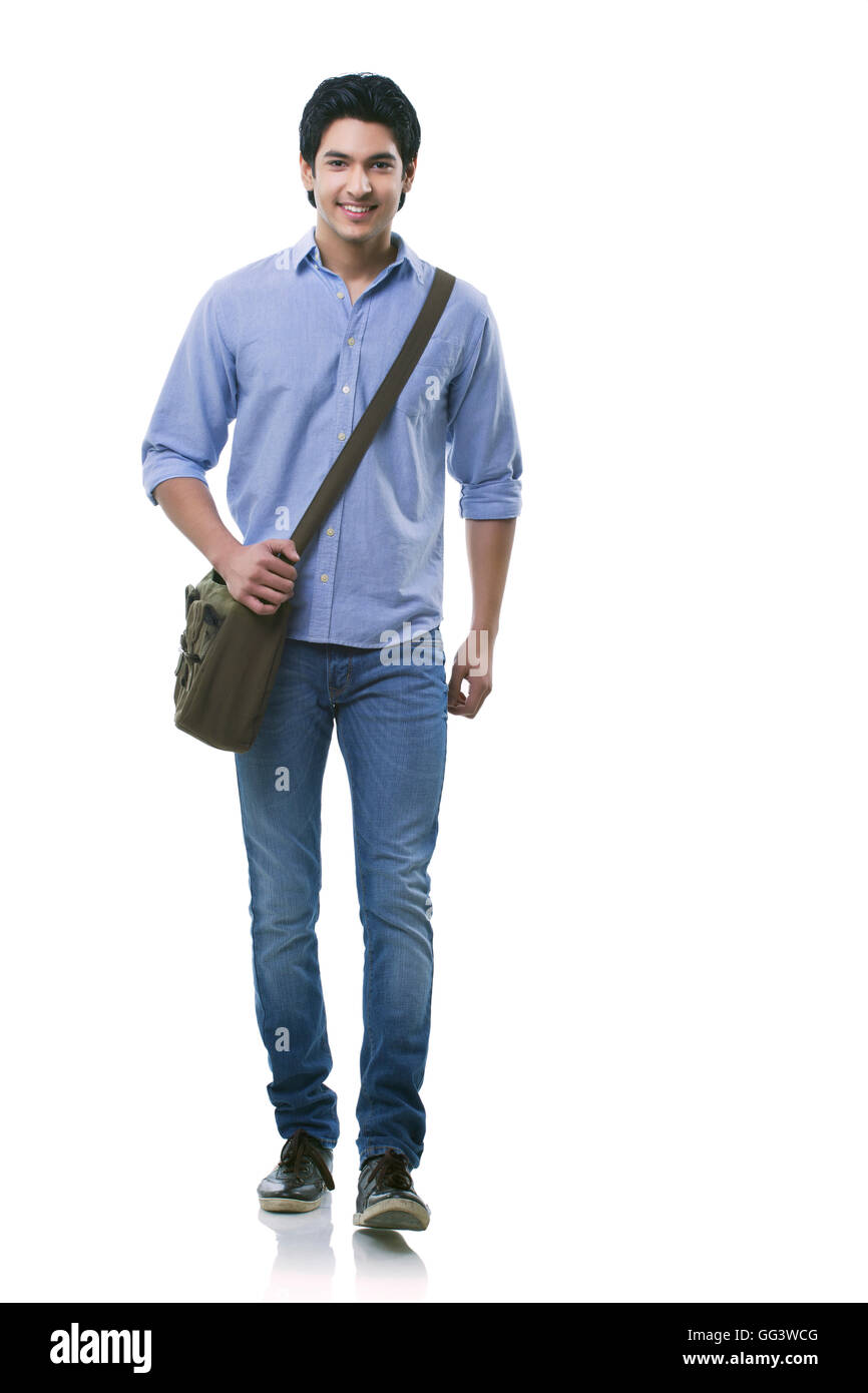 Indian man walking to camera Cut Out Stock Images & Pictures - Alamy