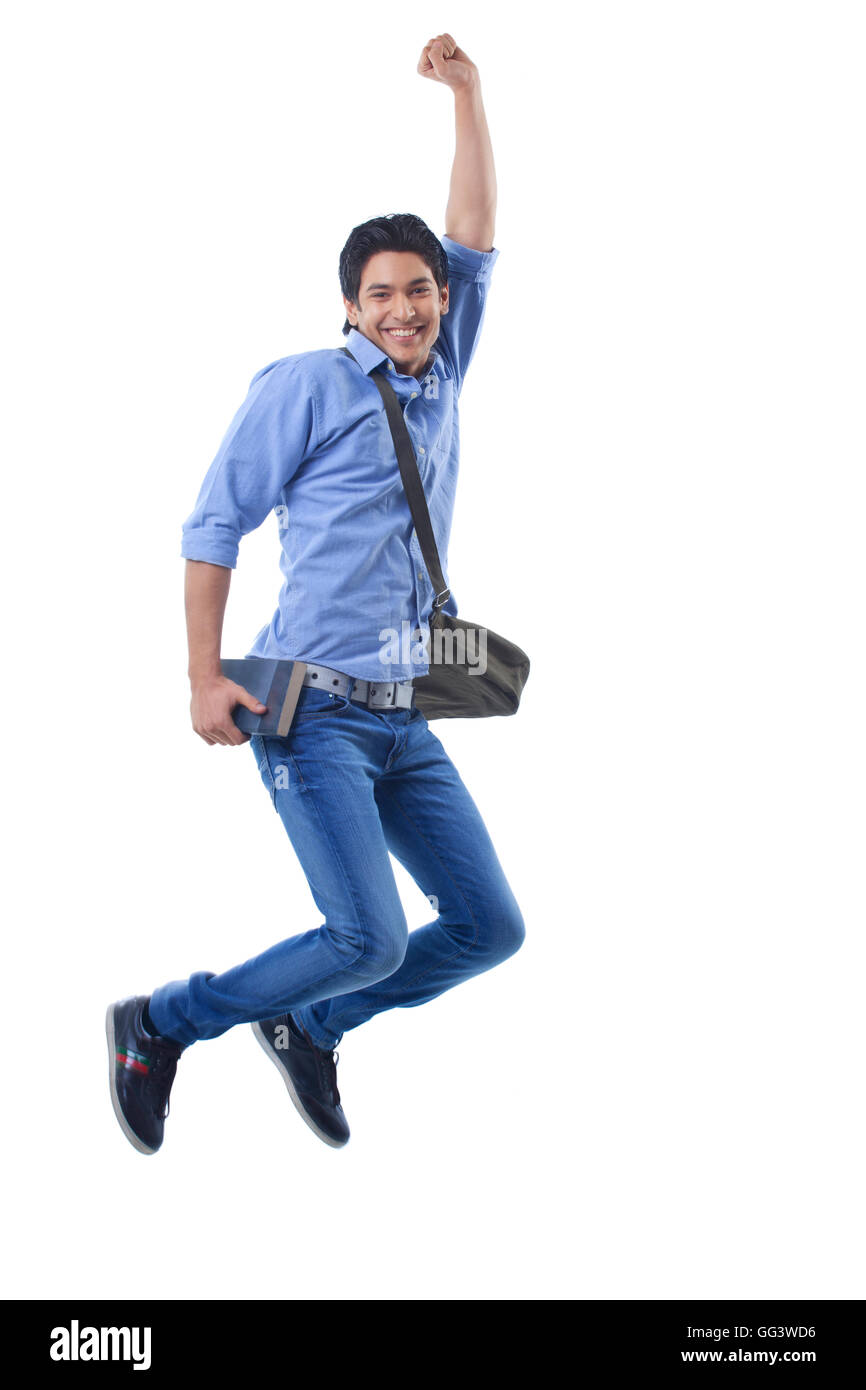 Indian college student jumping hi-res stock photography and images - Alamy