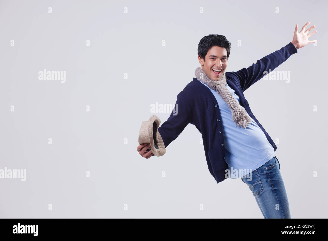 Happy young man dancing Stock Photo - Alamy