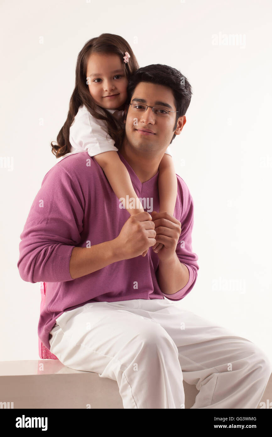 Portrait of father and daughter over white background Stock Photo - Alamy