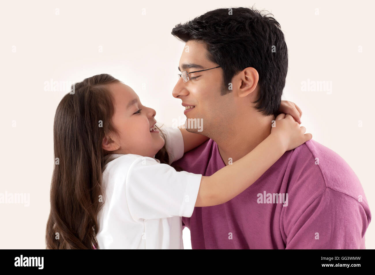 Father and little daughter hugging Stock Photo - Alamy