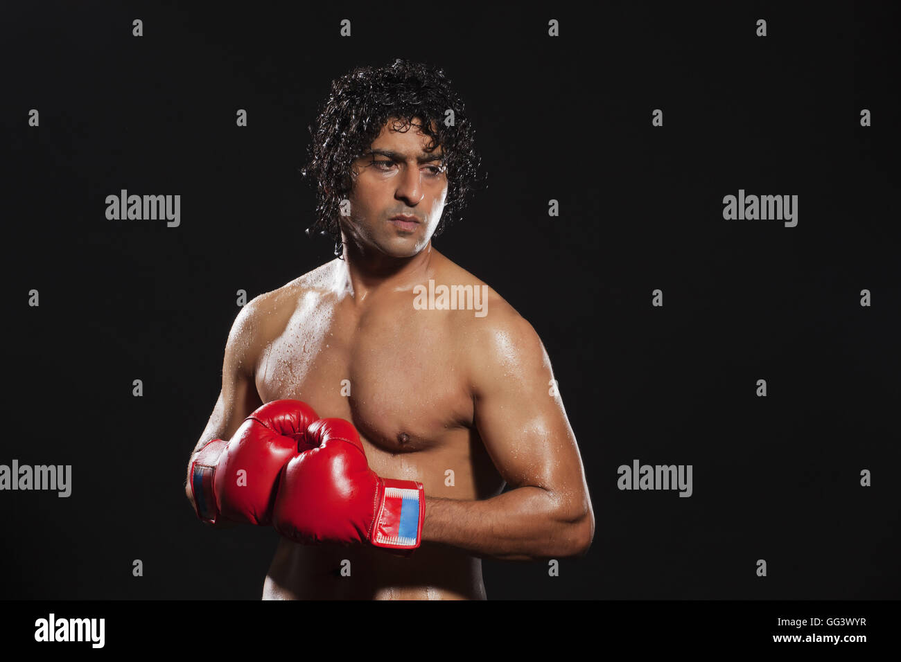 Young black boxer looking hi-res stock photography and images - Alamy