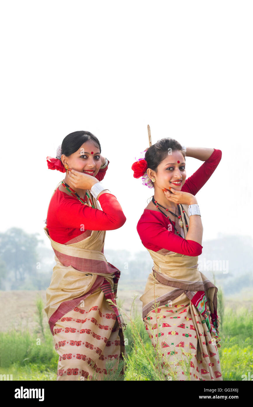 Portrait of women performing Bihu dance Stock Photo - Alamy
