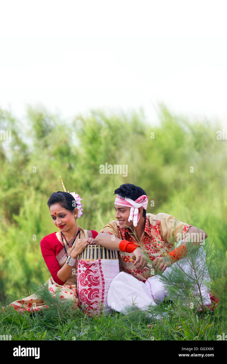 Bihu dancers sitting together Stock Photo - Alamy