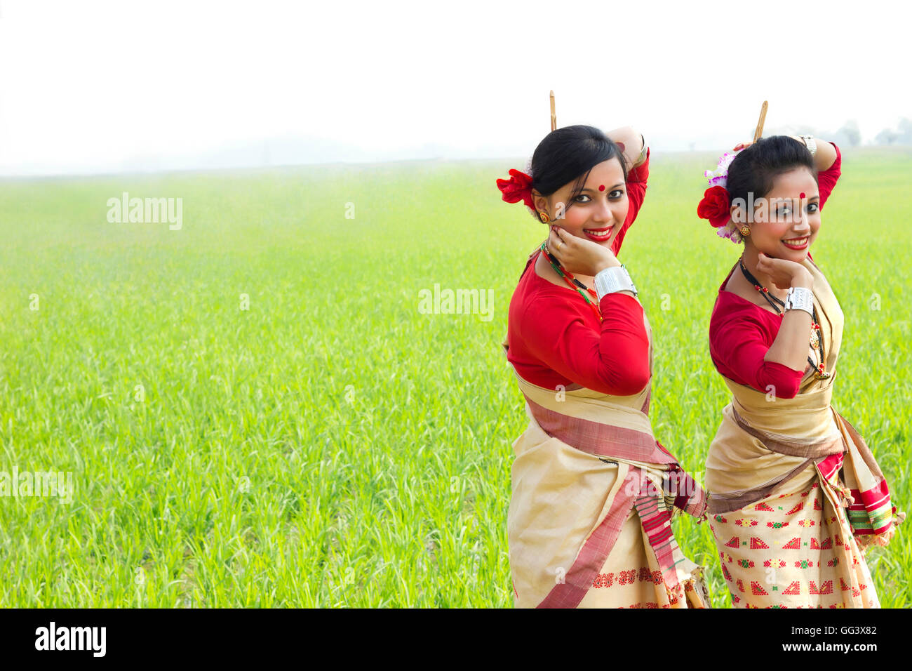 Portrait of women doing Bihu dance Stock Photo - Alamy