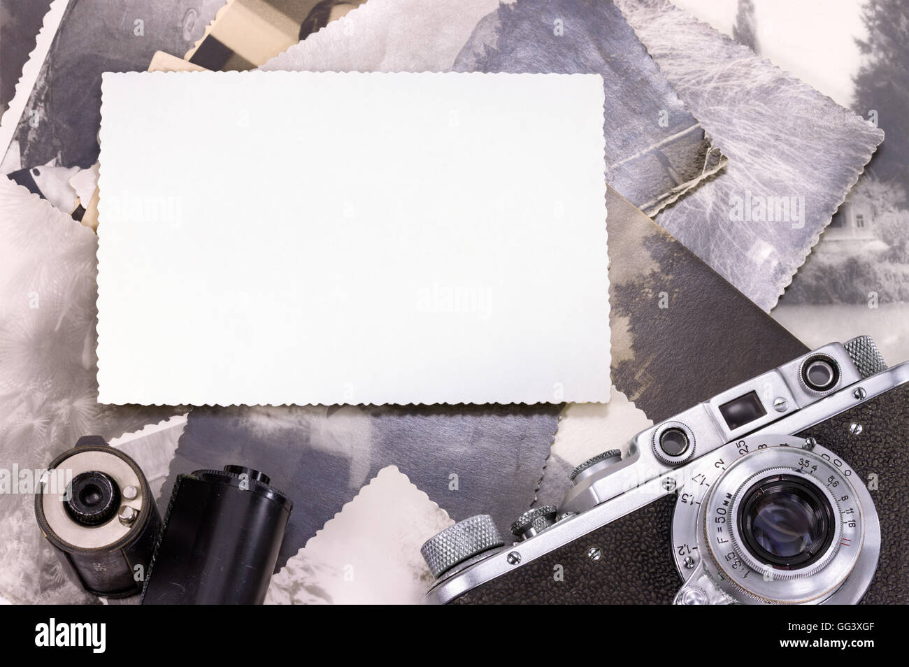 Vintage camera with empty photo frame Stock Photo - Alamy