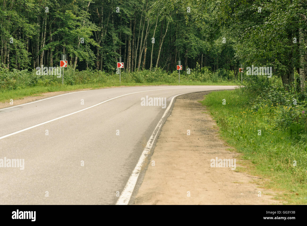 Twisting road between the trees Stock Photo - Alamy