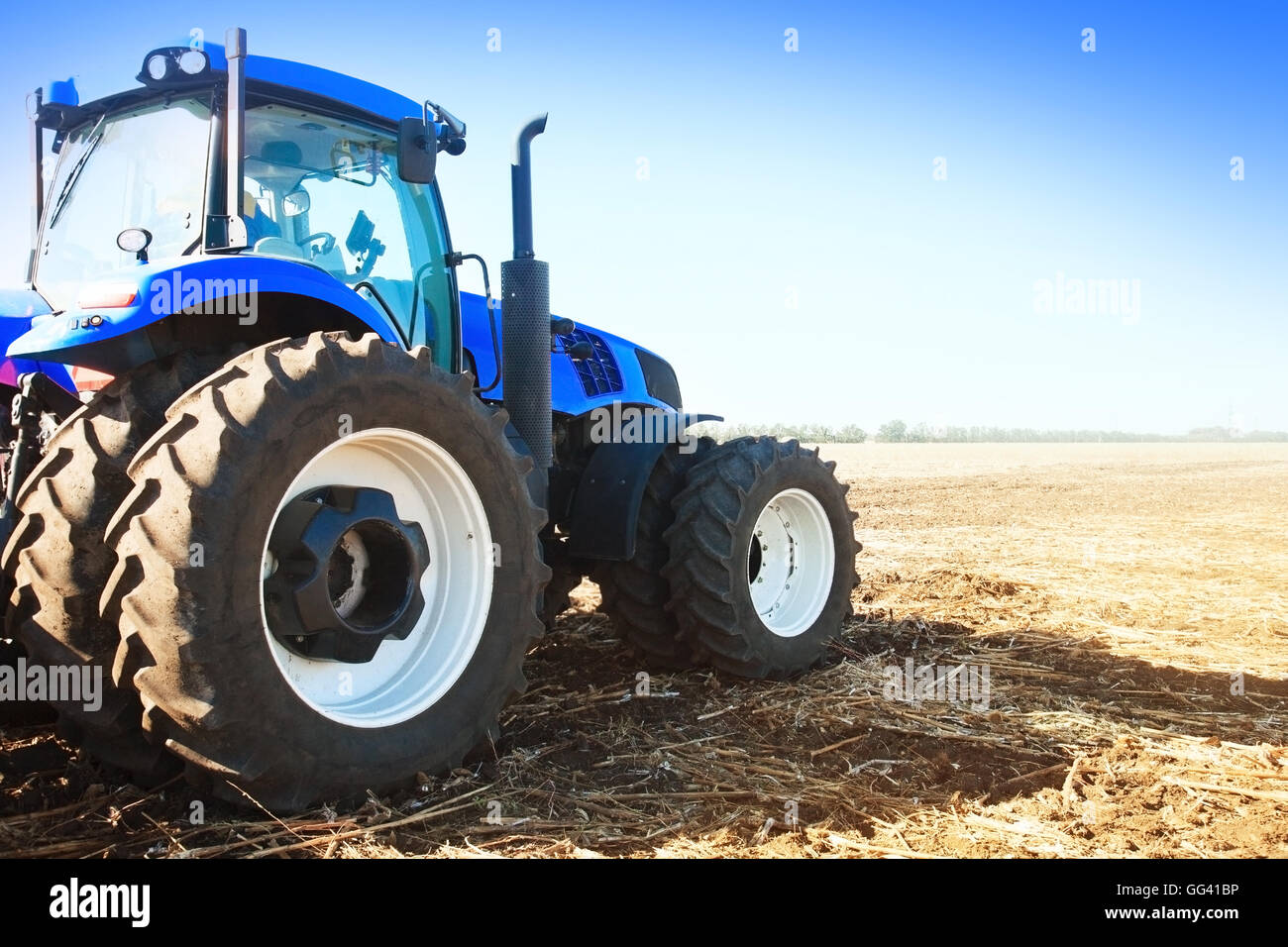 Bright blue tractor hi-res stock photography and images - Alamy