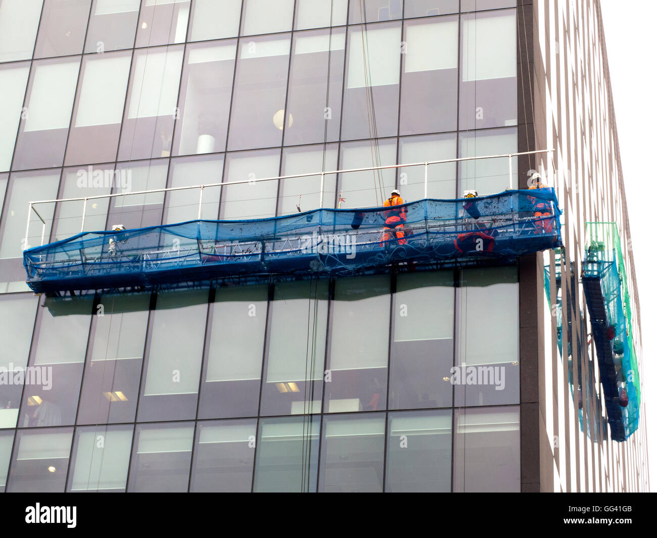 Windows being cleaned in Mann Island Liverpool Lancashire Stock Photo ...