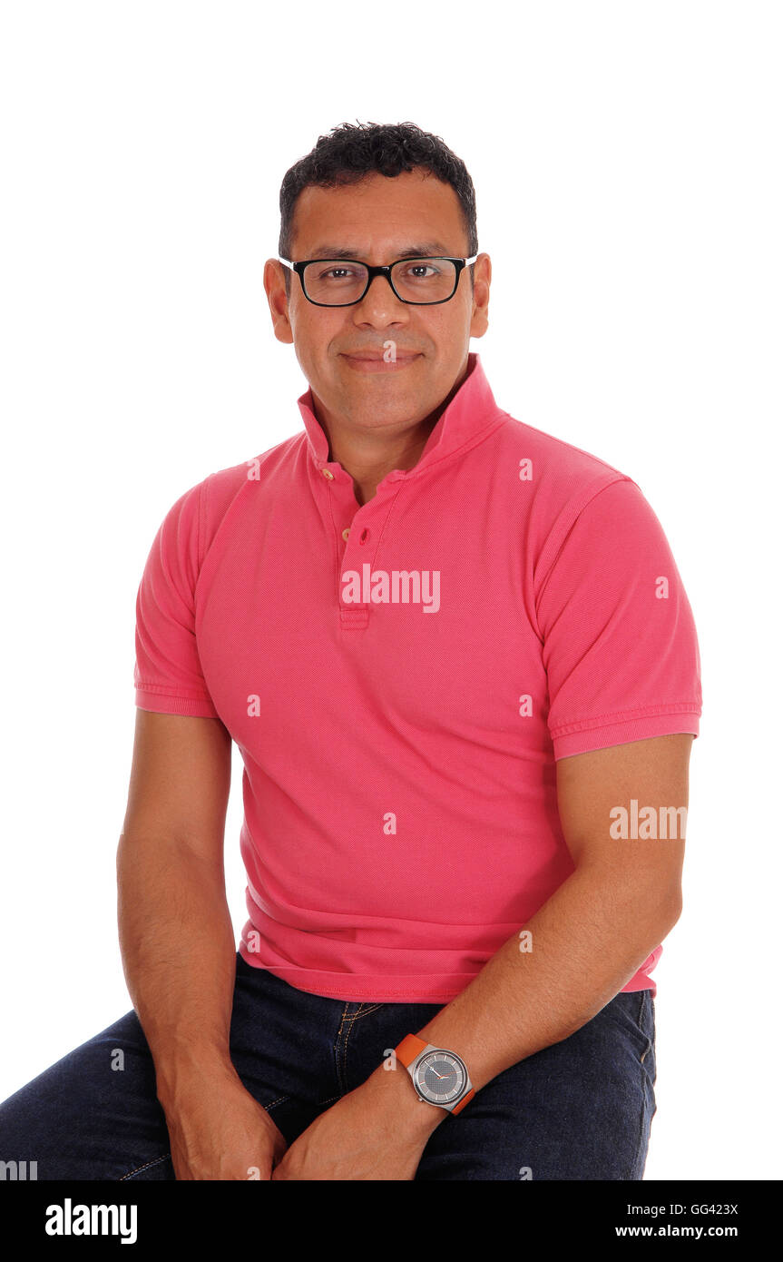 A closeup portrait image of a middle age Hispanic male sitting isolated ...