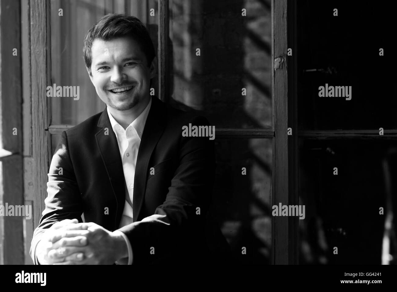 Model in red suit Black and White Stock Photos & Images - Alamy