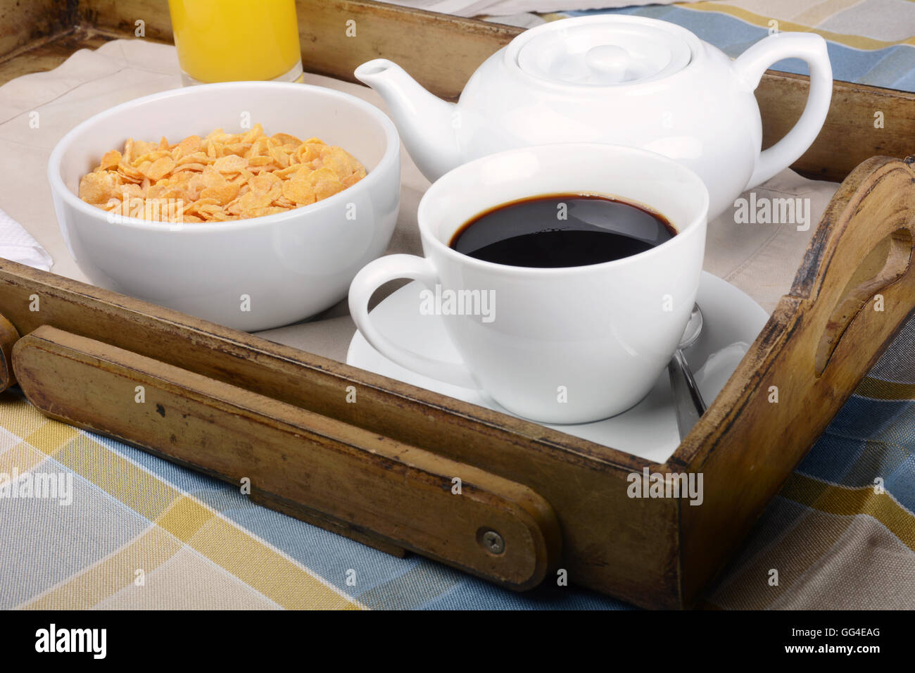 Breakfast tray with coffee, orange juice and bowl of cereals Stock ...