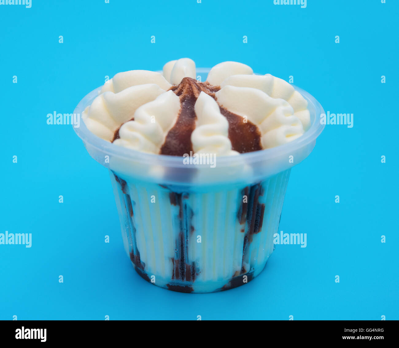 side view cup of chocolate flavor ice cream on blue background Stock ...