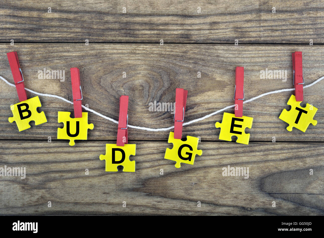 Puzzle pieces with word Budget Stock Photo - Alamy