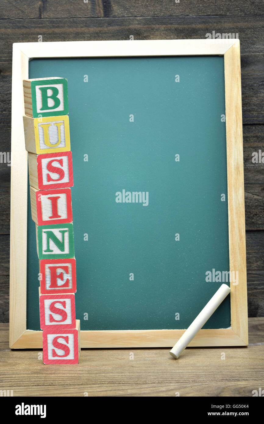 School board and word Business on wooden table Stock Photo - Alamy