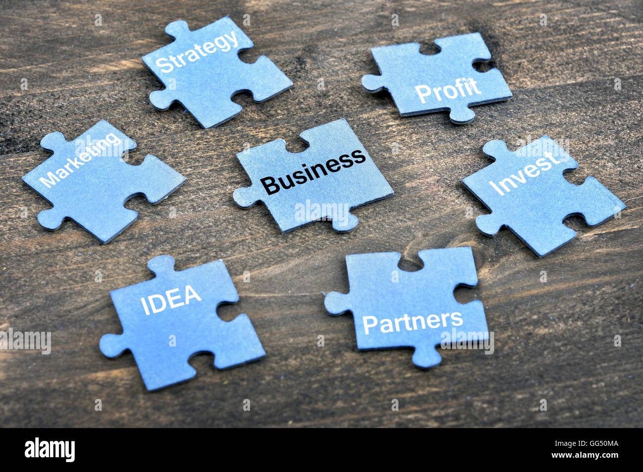 Puzzle pieces with word Business Stock Photo - Alamy