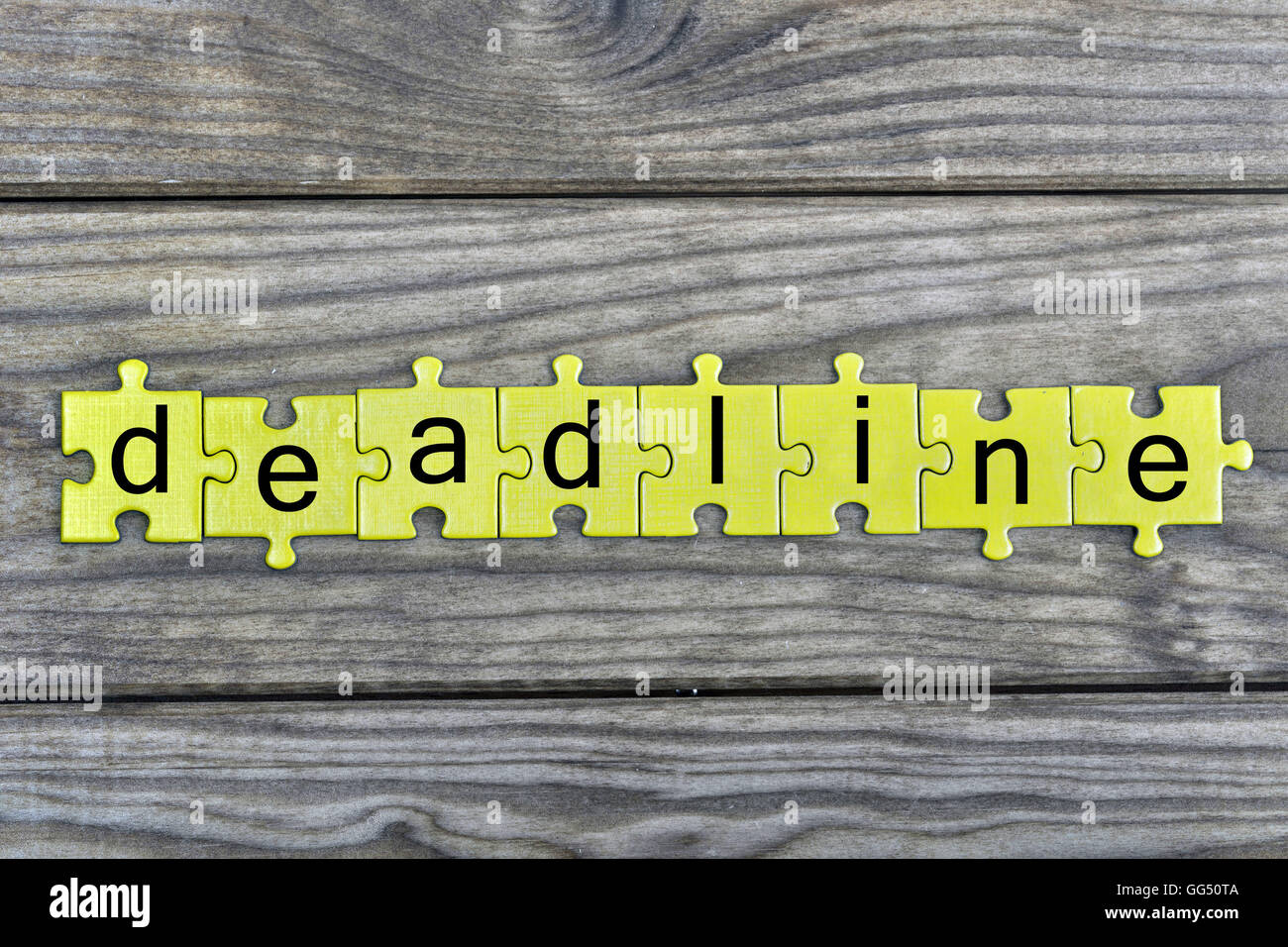 Puzzle pieces with word Deadline Stock Photo - Alamy