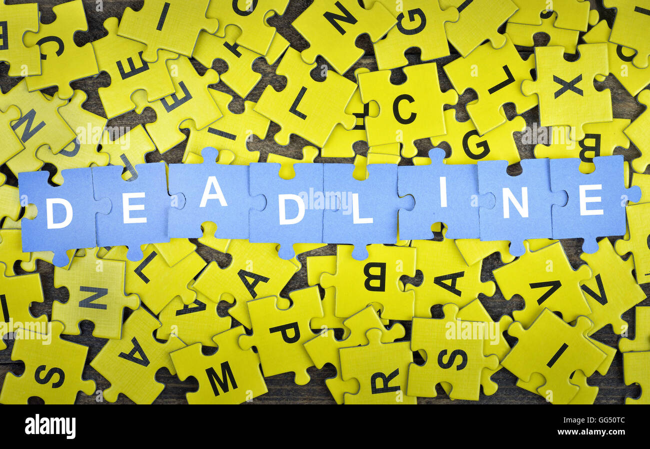 Puzzle pieces with word Deadline Stock Photo - Alamy