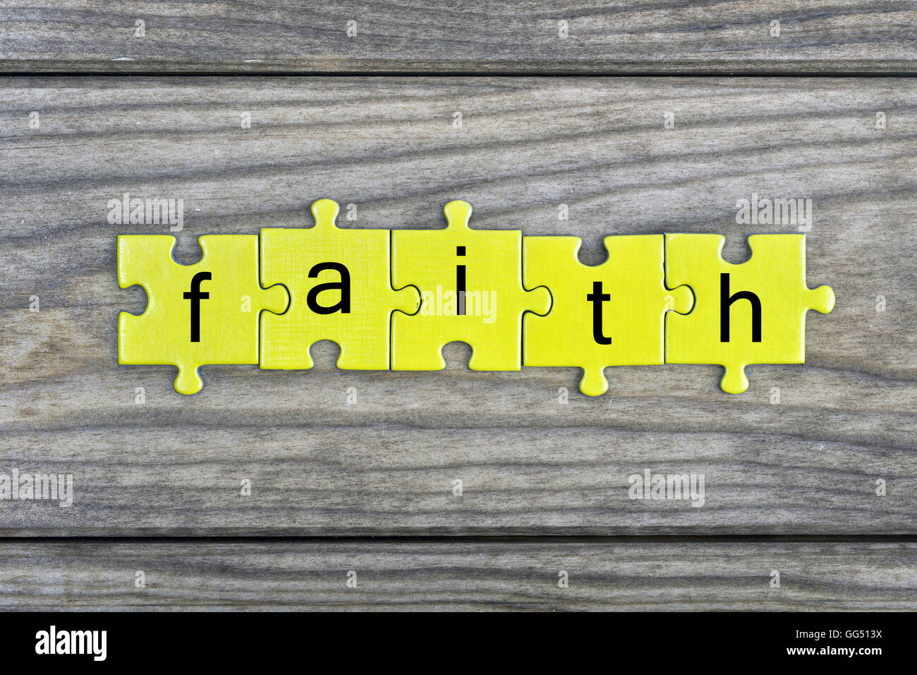 Puzzle pieces with word Faith Stock Photo - Alamy