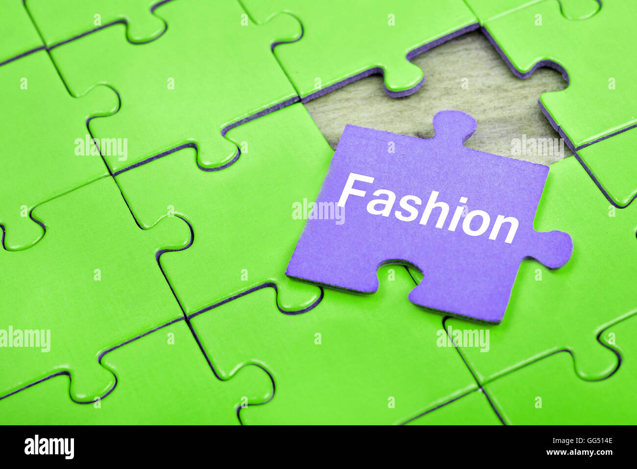 Puzzle pieces with word Fashion Stock Photo - Alamy