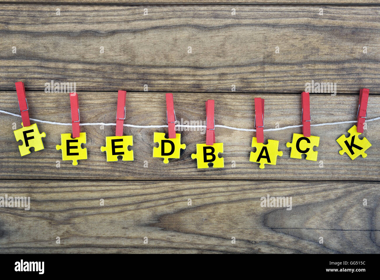 Puzzle pieces with word Feedback Stock Photo - Alamy
