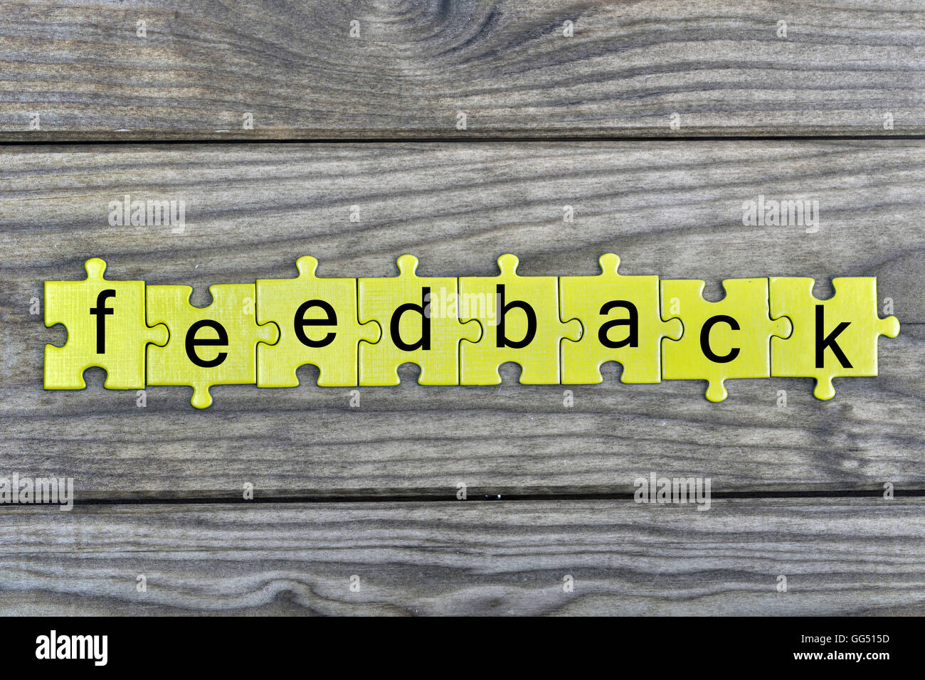 Puzzle pieces with word Feedback Stock Photo - Alamy