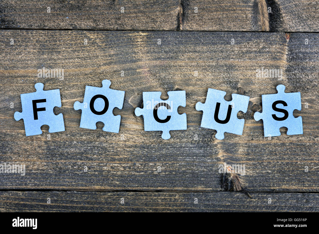 Puzzle pieces with word Focus Stock Photo - Alamy