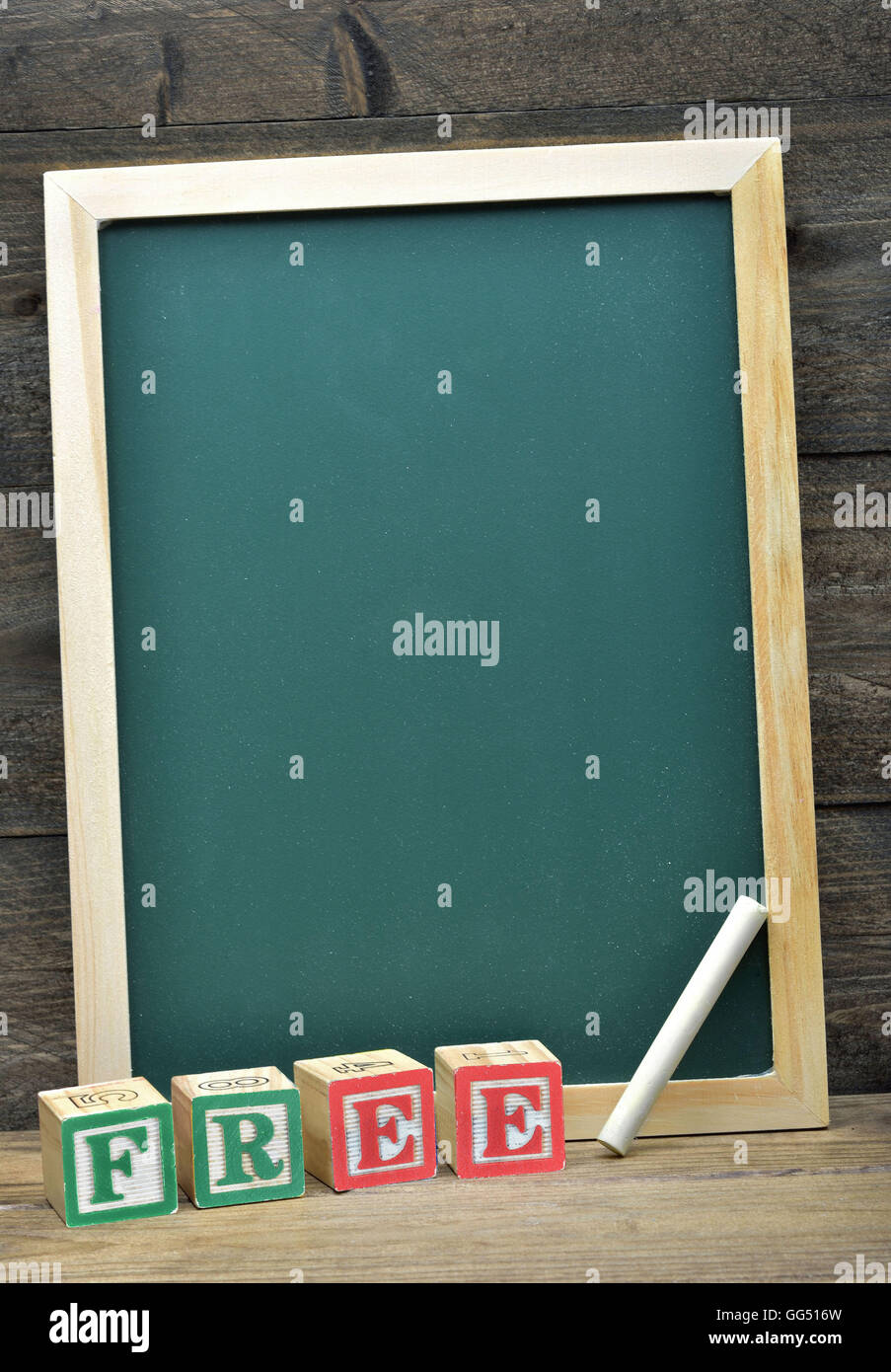 School board and word Free on wooden table Stock Photo - Alamy