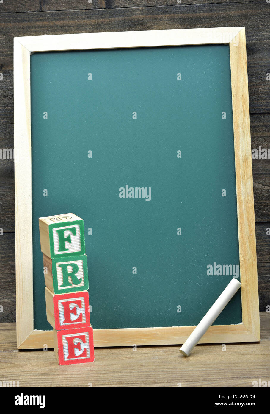 School board and word Free on wooden table Stock Photo - Alamy
