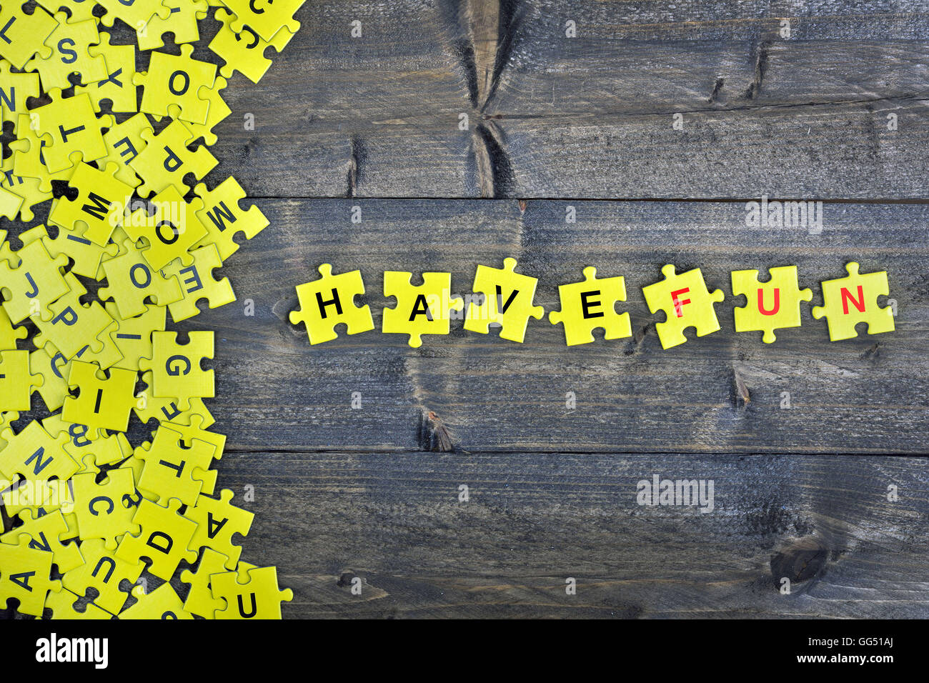 Puzzle pieces with word Have fun Stock Photo - Alamy