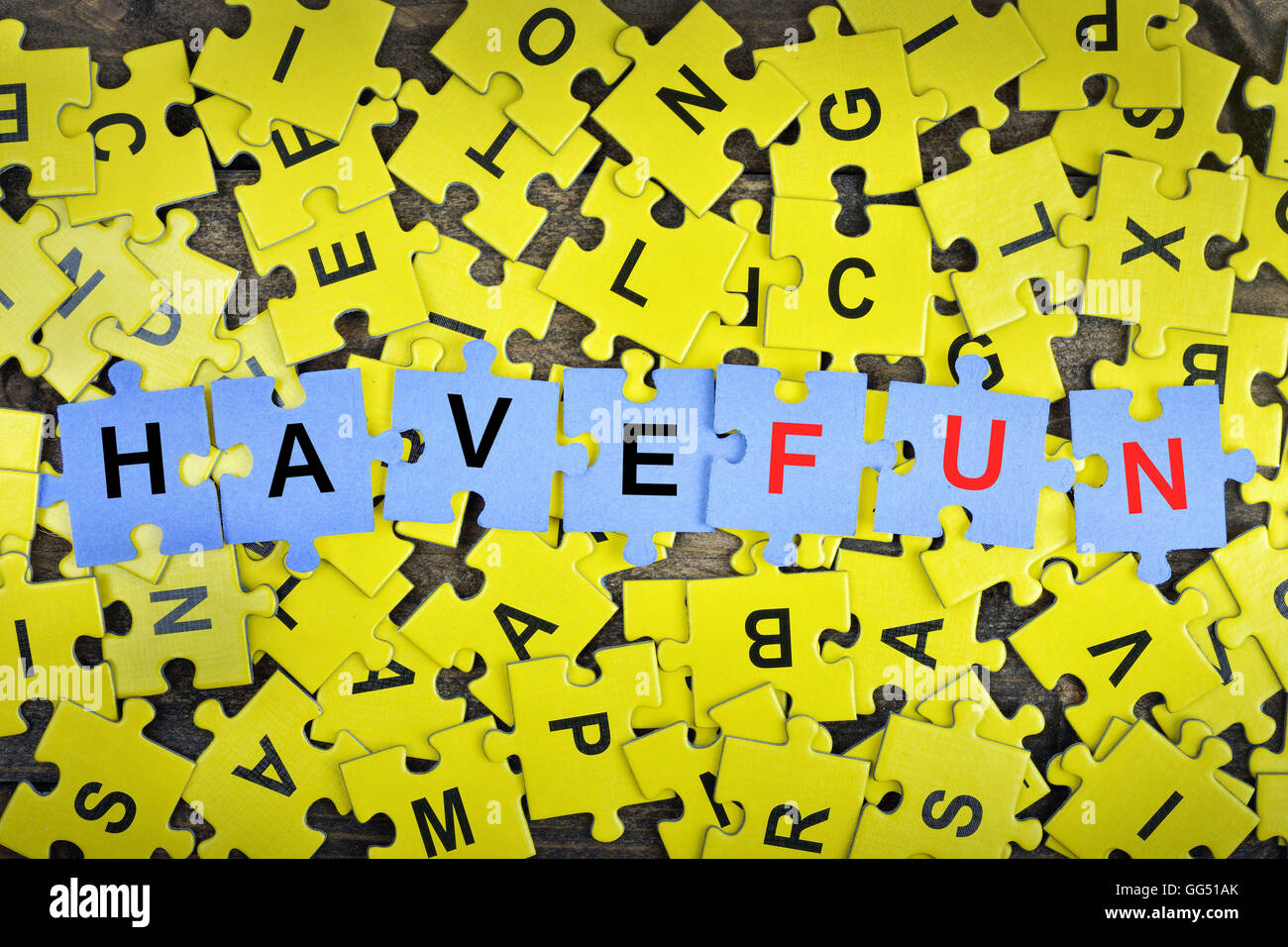Puzzle pieces with word Have fun Stock Photo - Alamy