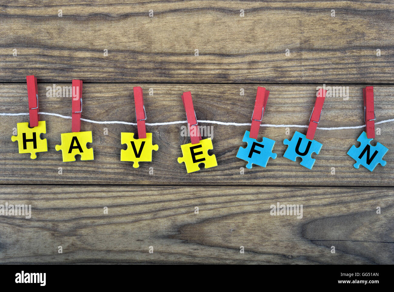 Puzzle pieces with word Have fun Stock Photo - Alamy