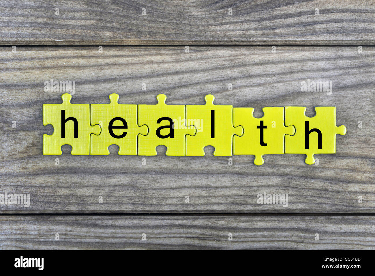 Puzzle pieces with word Health Stock Photo - Alamy