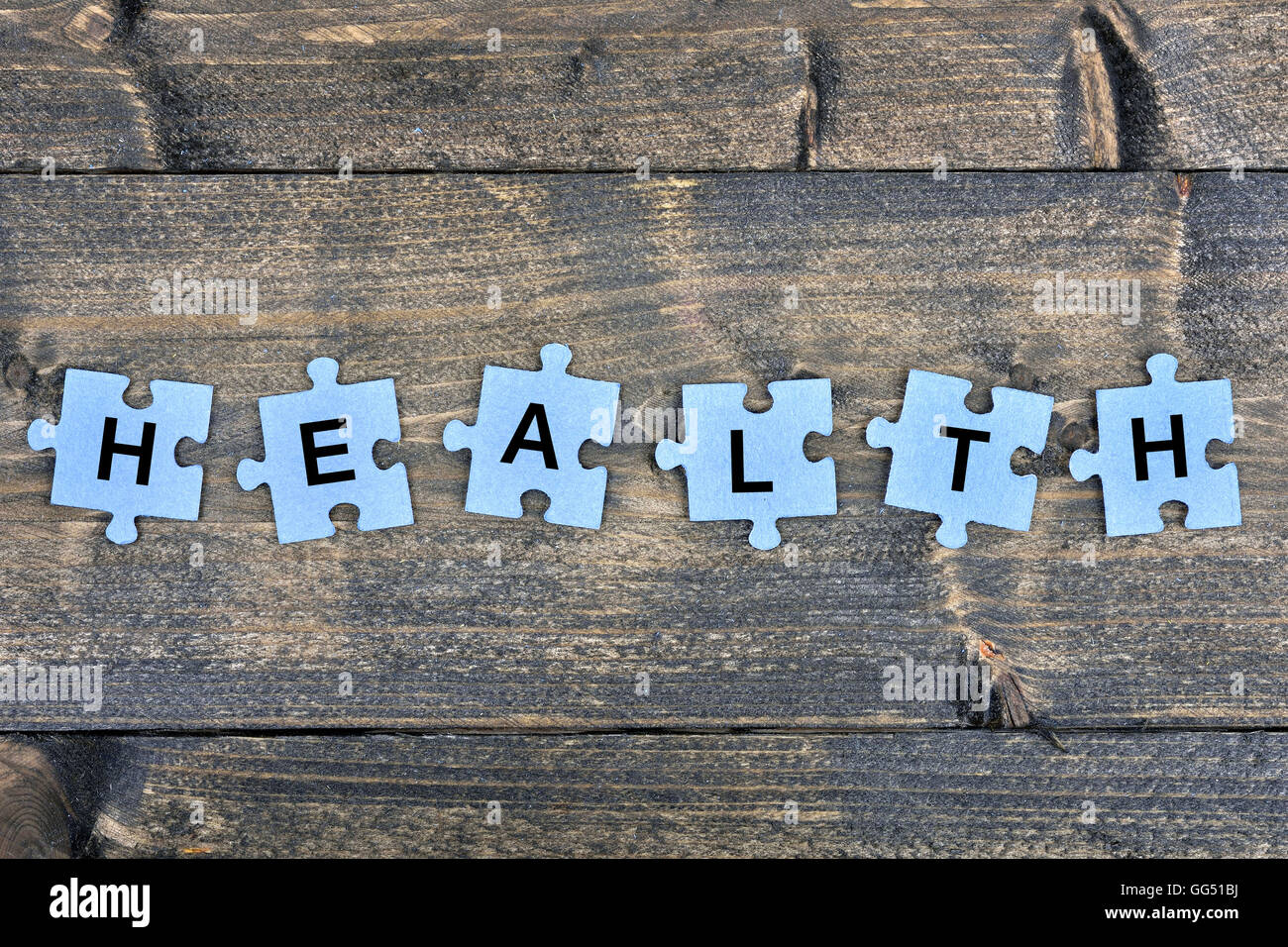 Puzzle pieces with word Health Stock Photo - Alamy