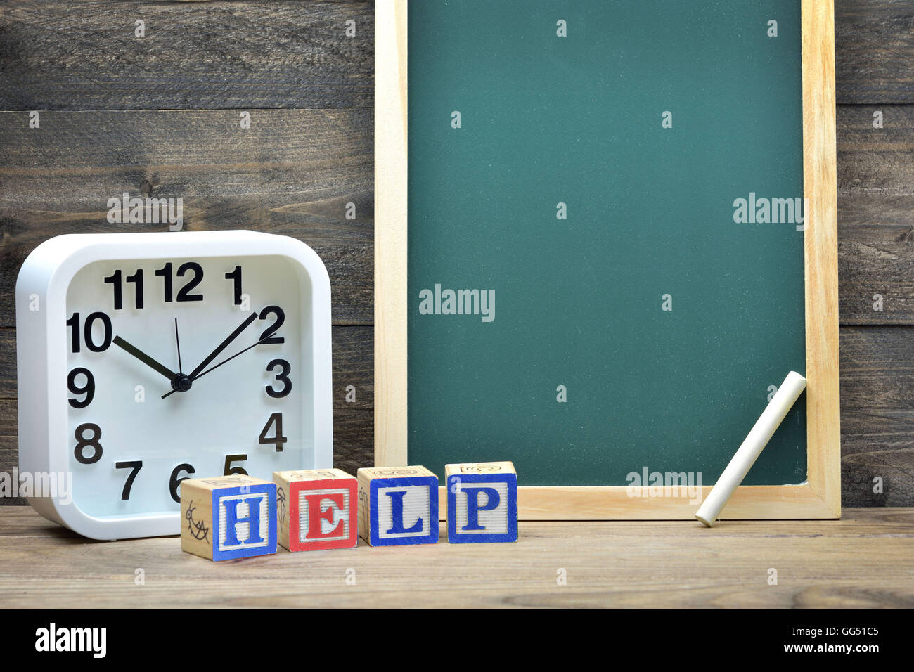 School board and word Help on wooden table Stock Photo - Alamy