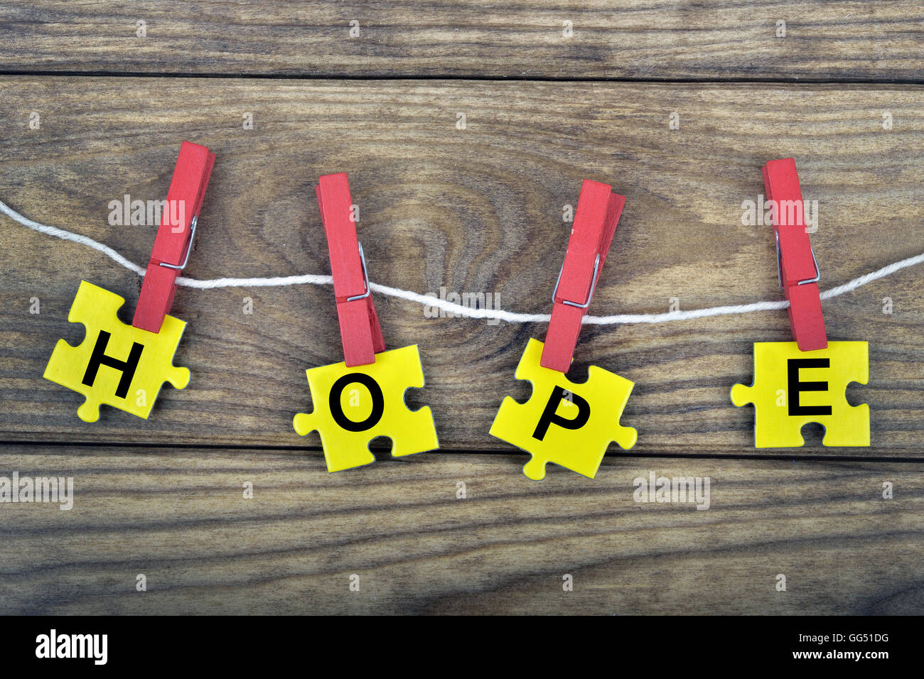 Puzzle pieces with word Hope Stock Photo - Alamy