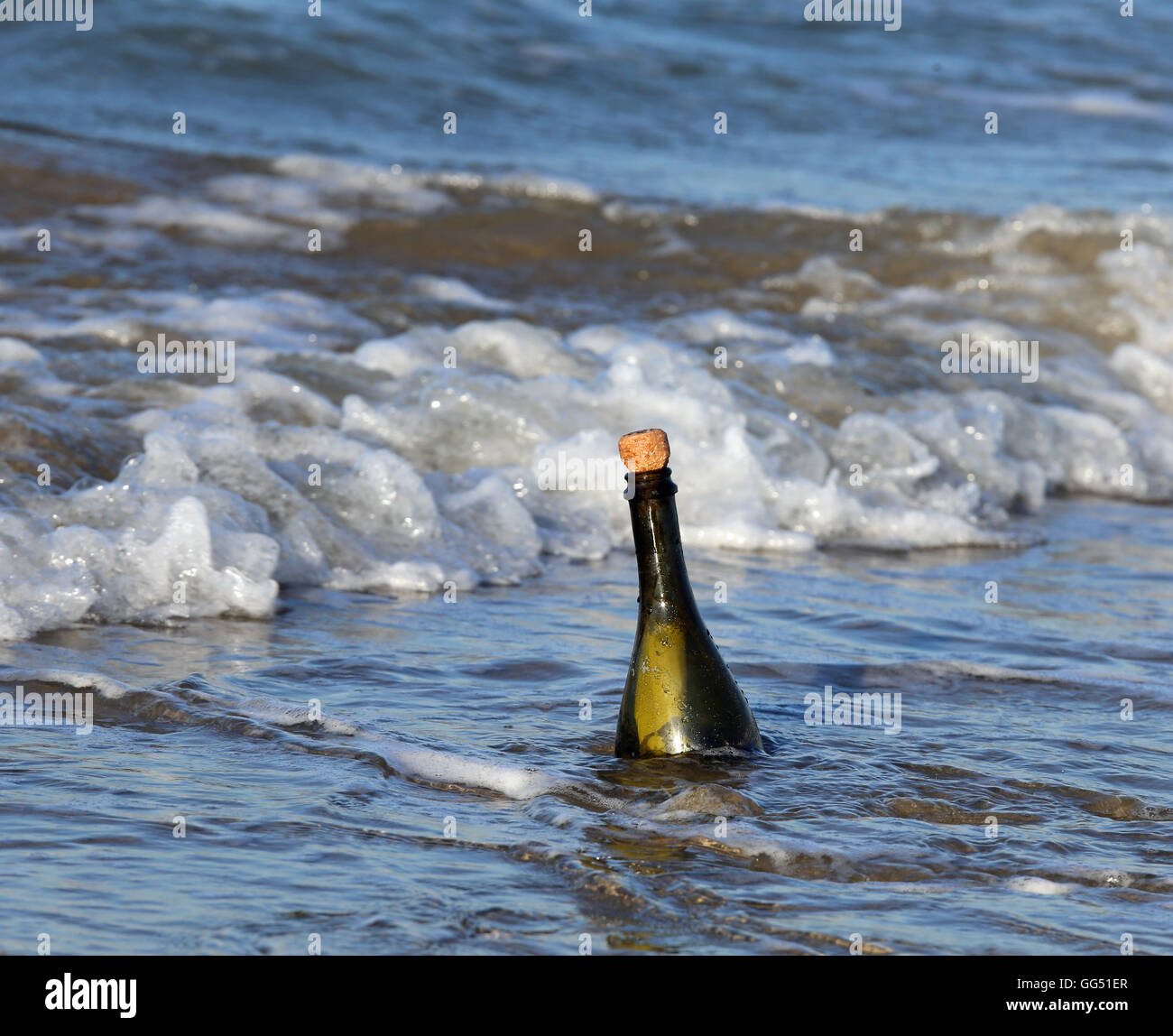 Secret Message in the glass bottle in the sea 11 Stock Photo - Alamy