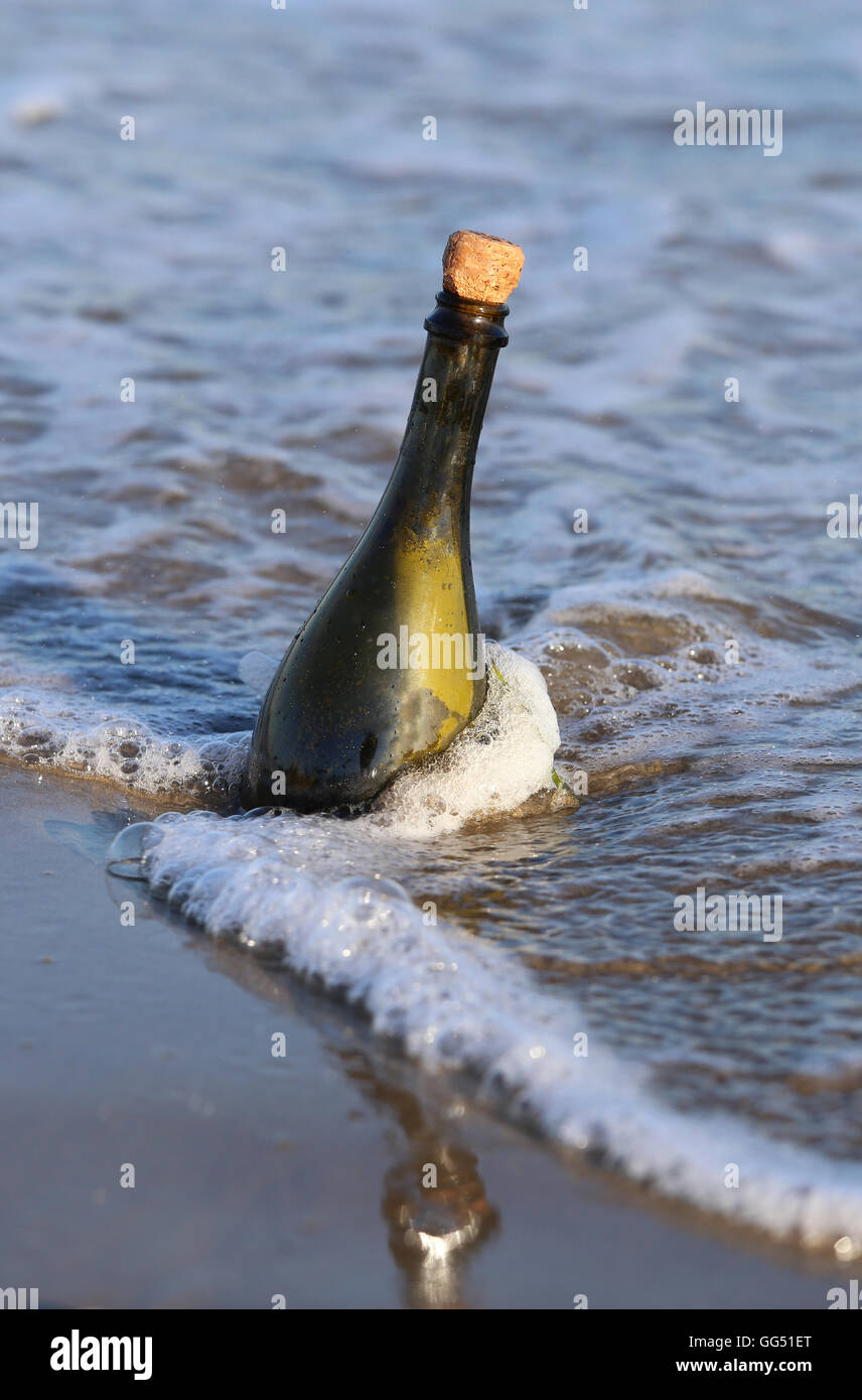Secret Message in the glass bottle on the beach Stock Photo - Alamy